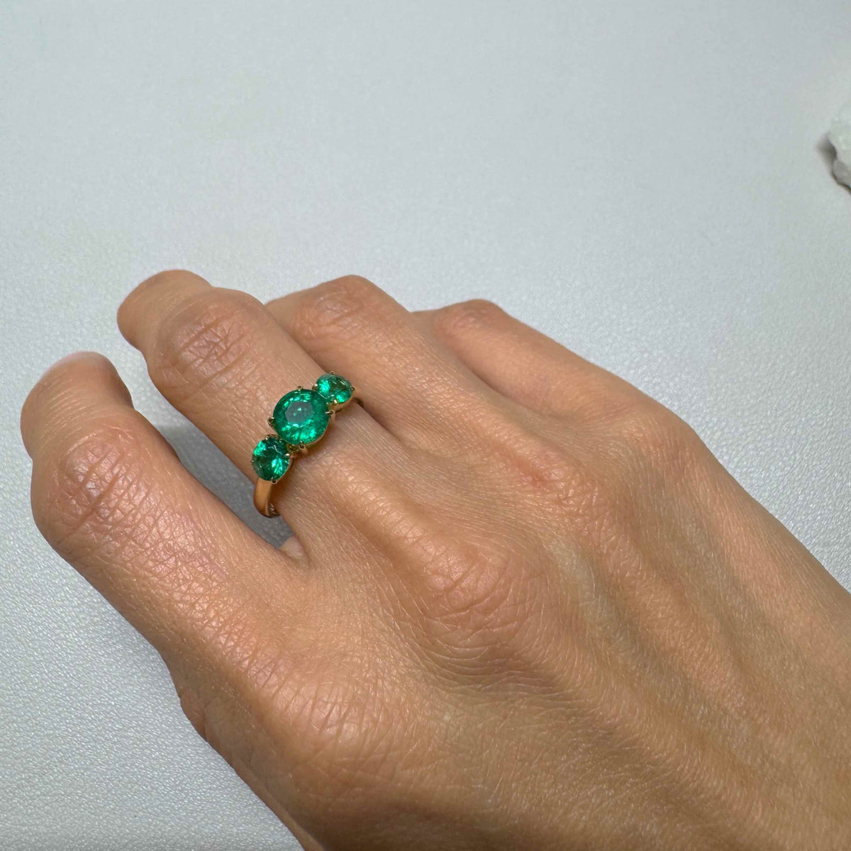 three stone emerald rings